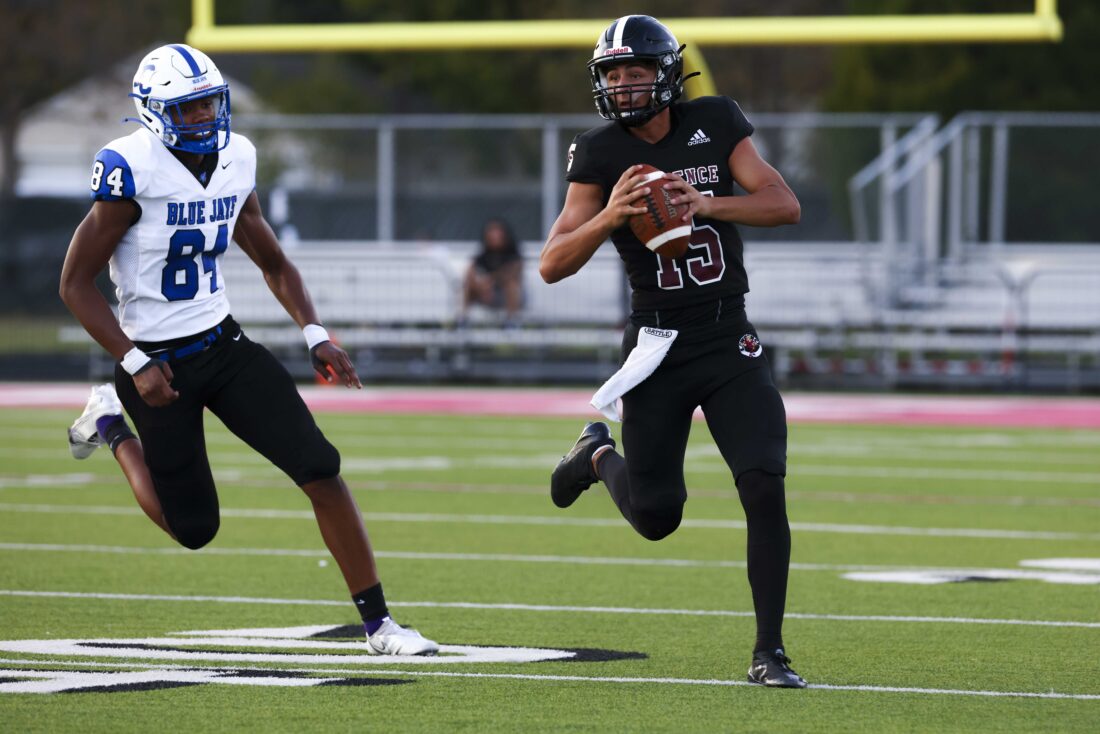 Lawrence football struggles to move the ball in 14-7 loss to Junction ...
